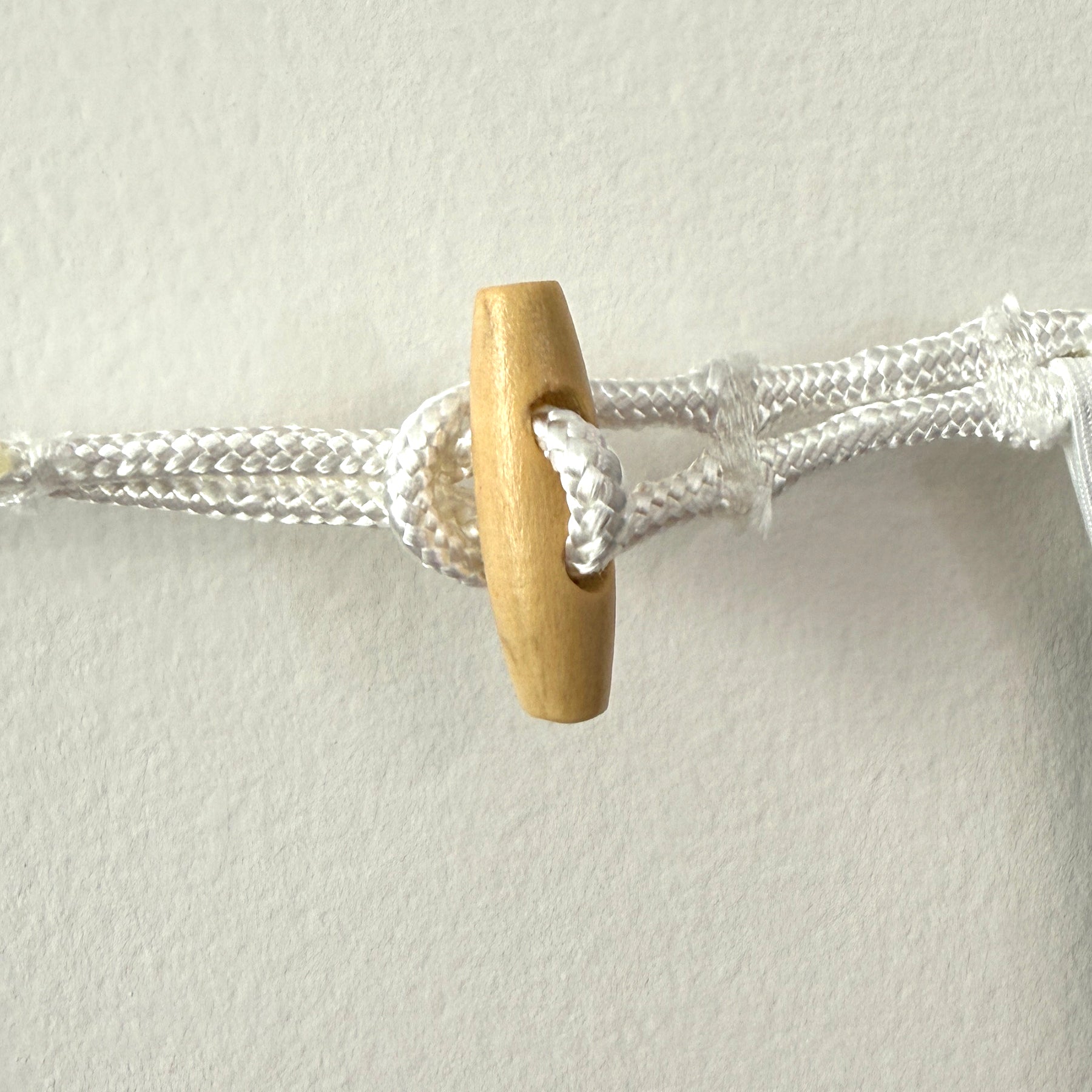 Cordage, loop and toggle button, 15